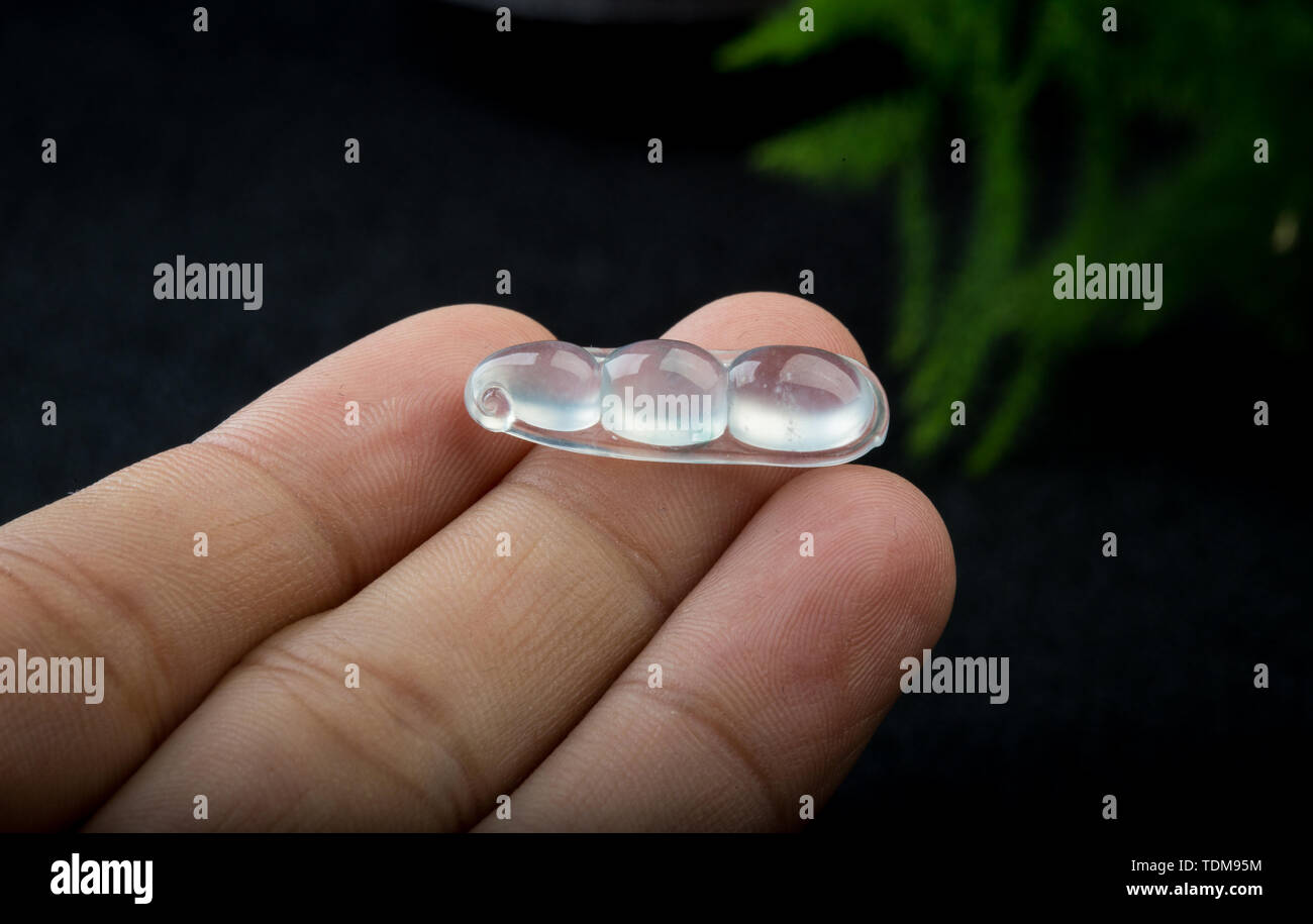 Glass, emerald beans Stock Photo - Alamy