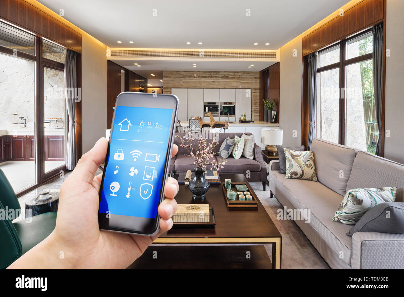smart phone with smart home with modern living room Stock Photo - Alamy