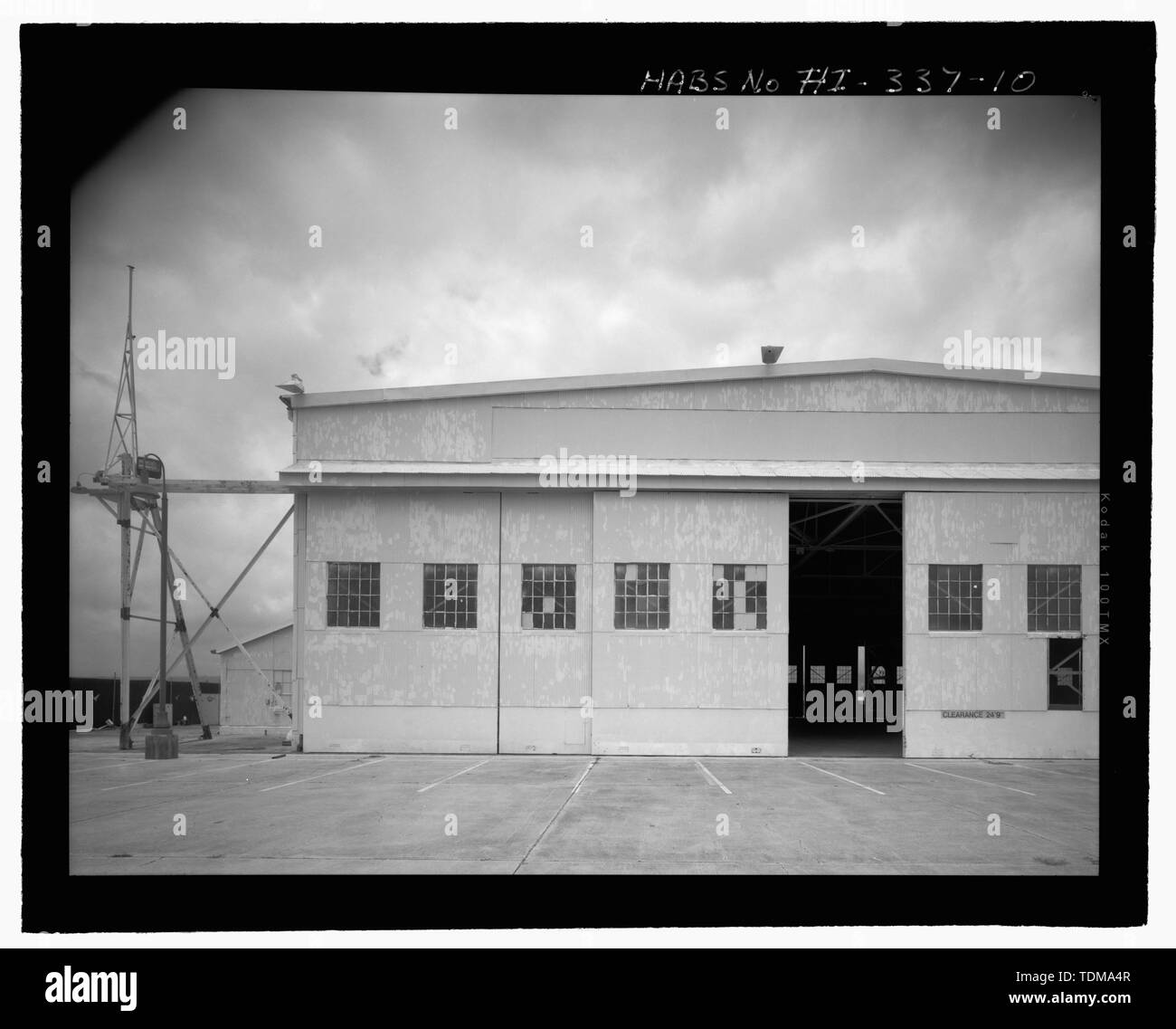 PARTIAL ELEVATION OF THE SOUTHWEST SIDE SHOWING THE LARGE SLIDING DOORS ...