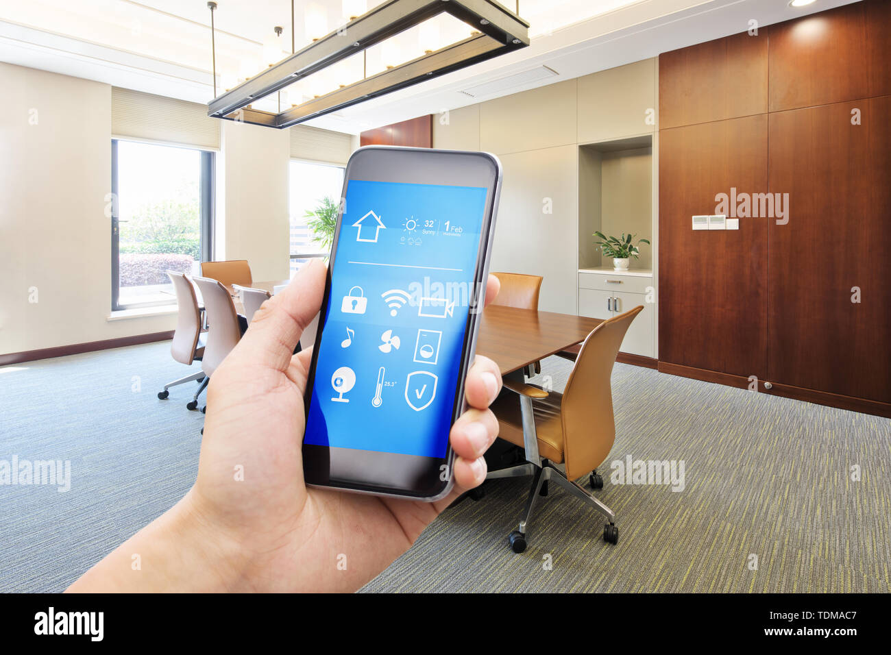 Mobile phone in modern meeting room Stock Photo - Alamy
