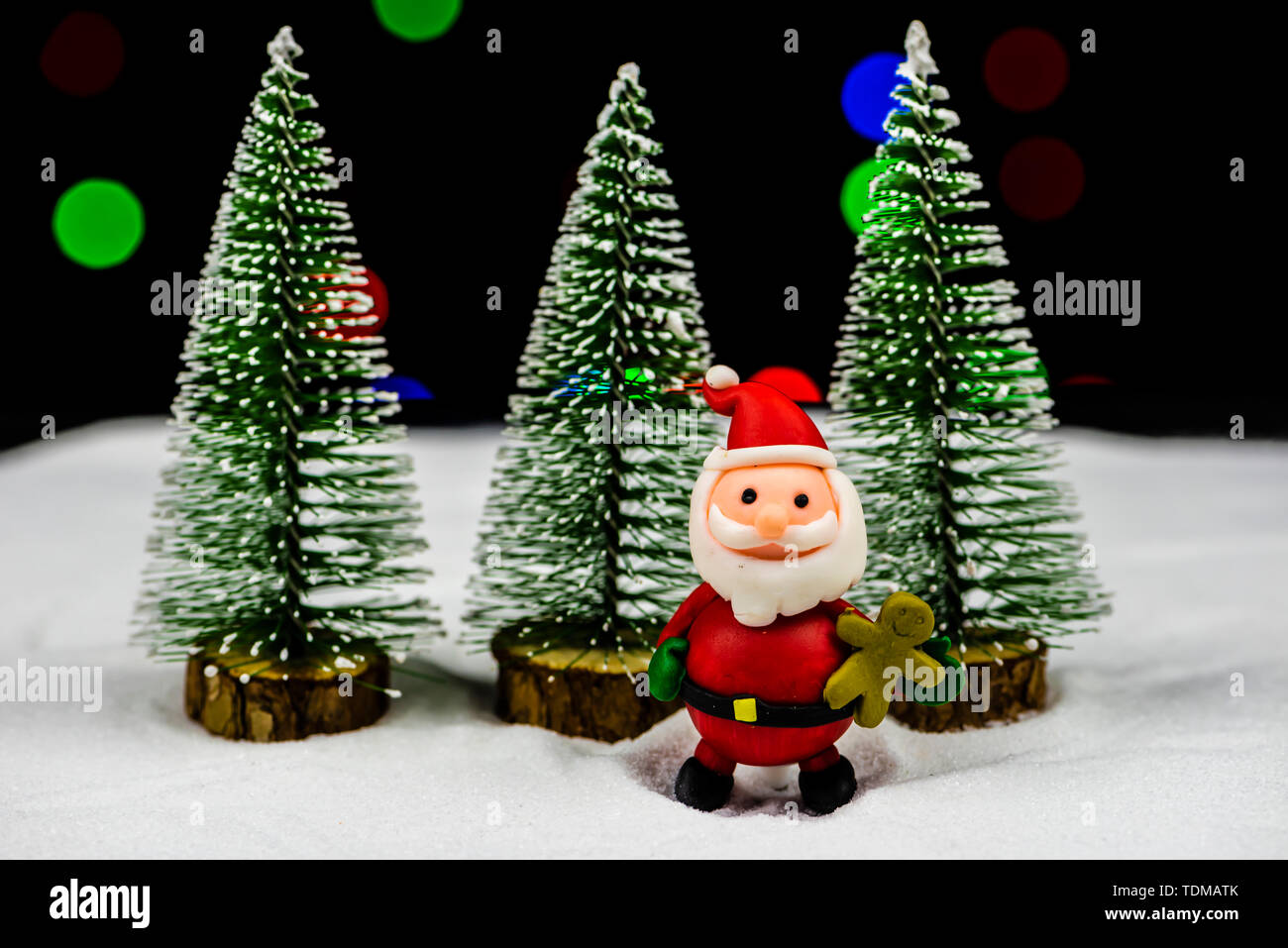 Santa Claus under the pine trees Stock Photo - Alamy