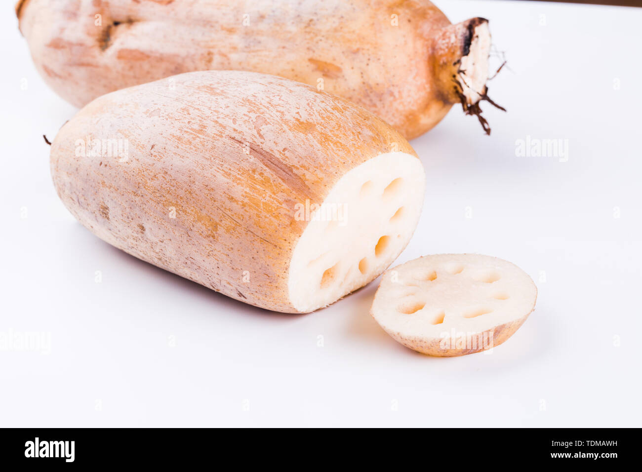 Fresh lotus root on white background Stock Photo - Alamy