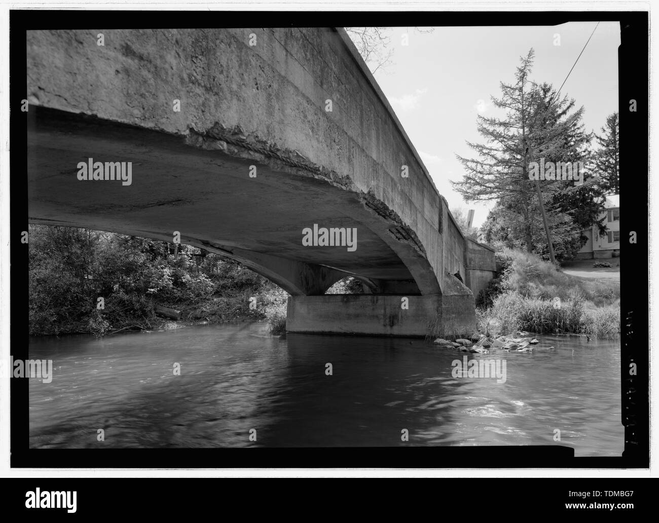 PERSPECTIVE OF UNDERSIDE SHOWING ARCHED GIRDER AND SLAB CONSTRUCTION ...