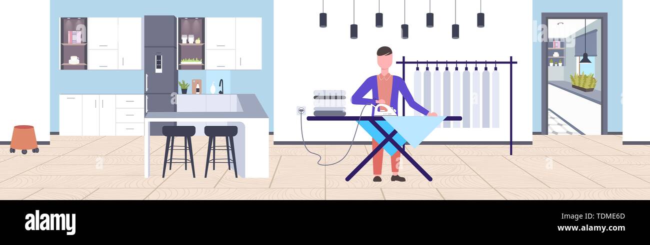 man ironing clothes guy using iron doing housework concept modern home ...