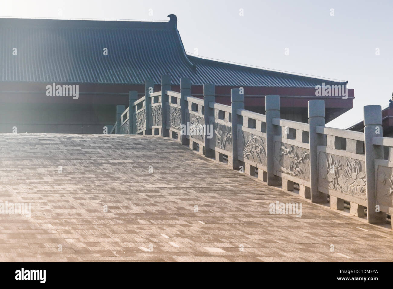Stone bridge railings in backlight with palace Stock Photo - Alamy