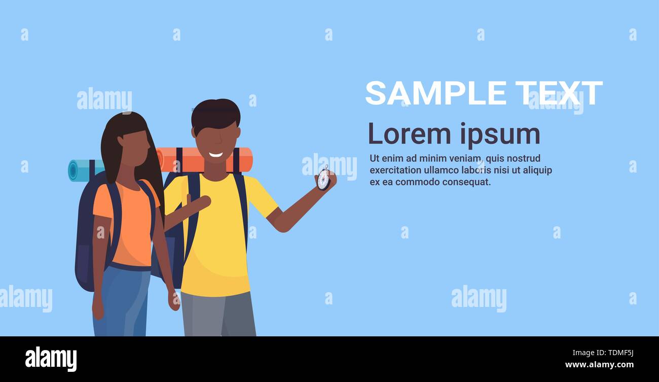 couple tourists hikers with backpacks using compass searching direction hiking concept man woman ...