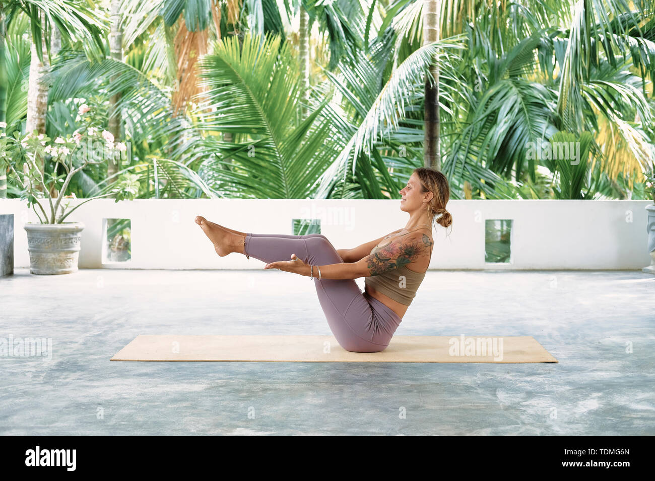 Woman Practicing Advanced Yoga on Organic Mat. Series of Yoga Poses ...