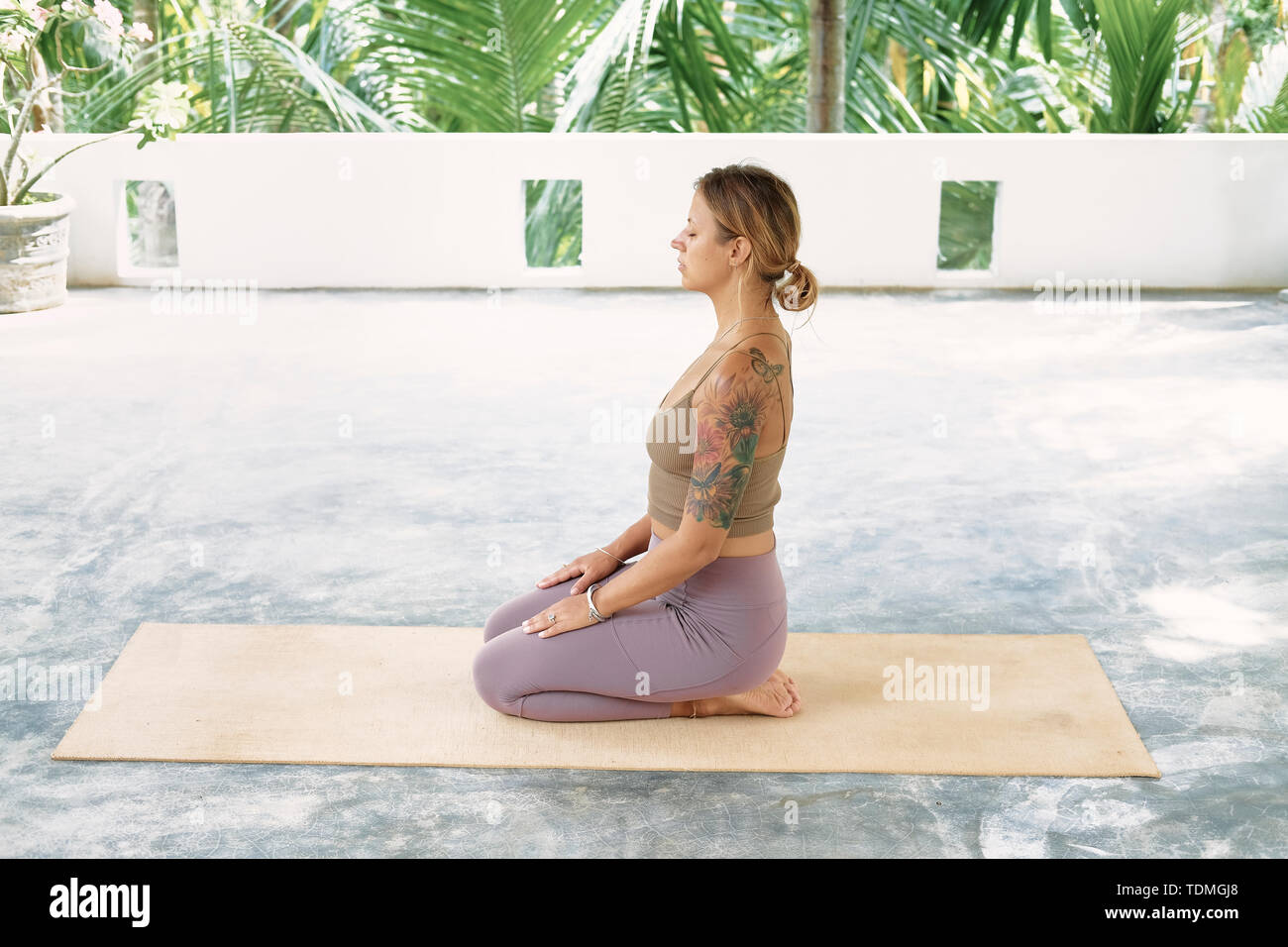 Woman Practicing Advanced Yoga on Organic Mat. Series of Yoga Poses ...