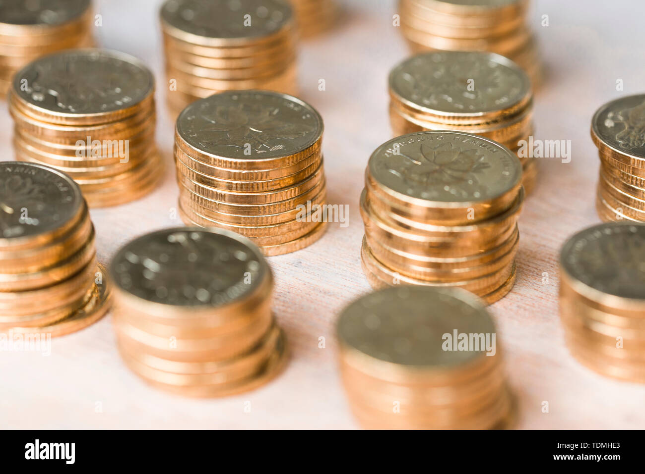 Stacked gold coins Stock Photo - Alamy