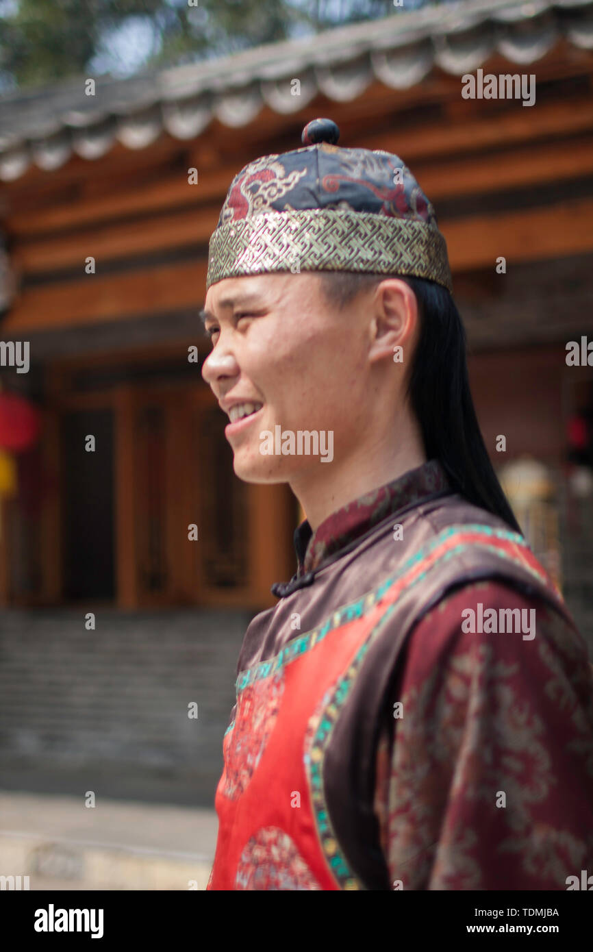 Beautiful and handsome men in Yunnan Ethnic Village Stock Photo - Alamy