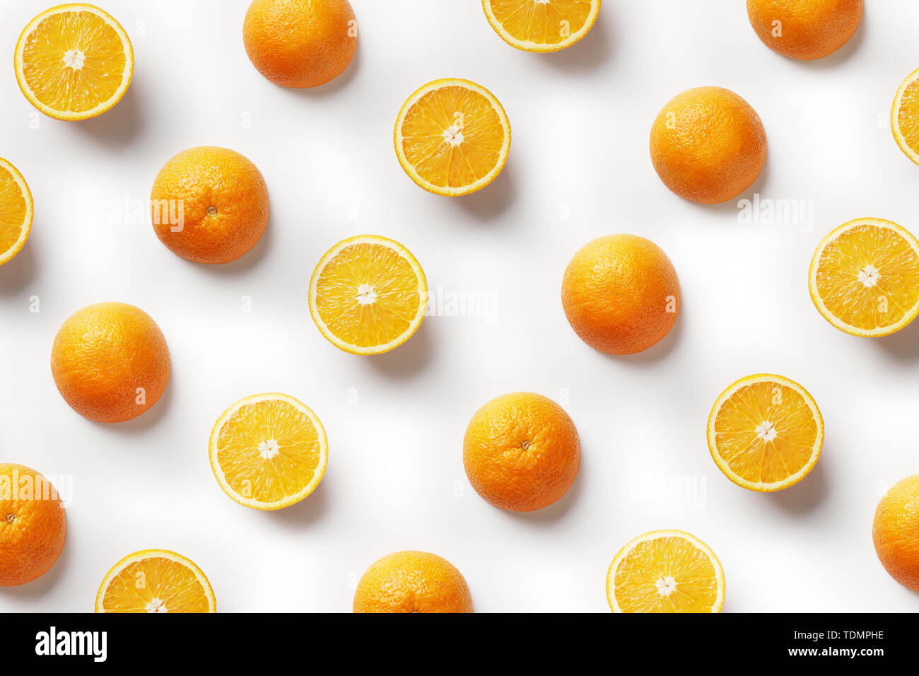 Tropical abstract background. Orange fruit on the white background ...