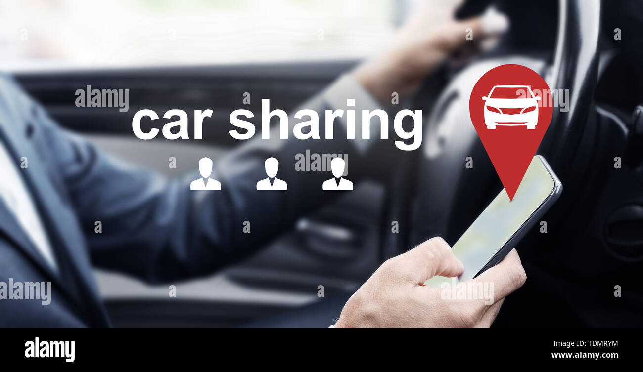 Man driving car and using mobile app of rental service Stock Photo - Alamy