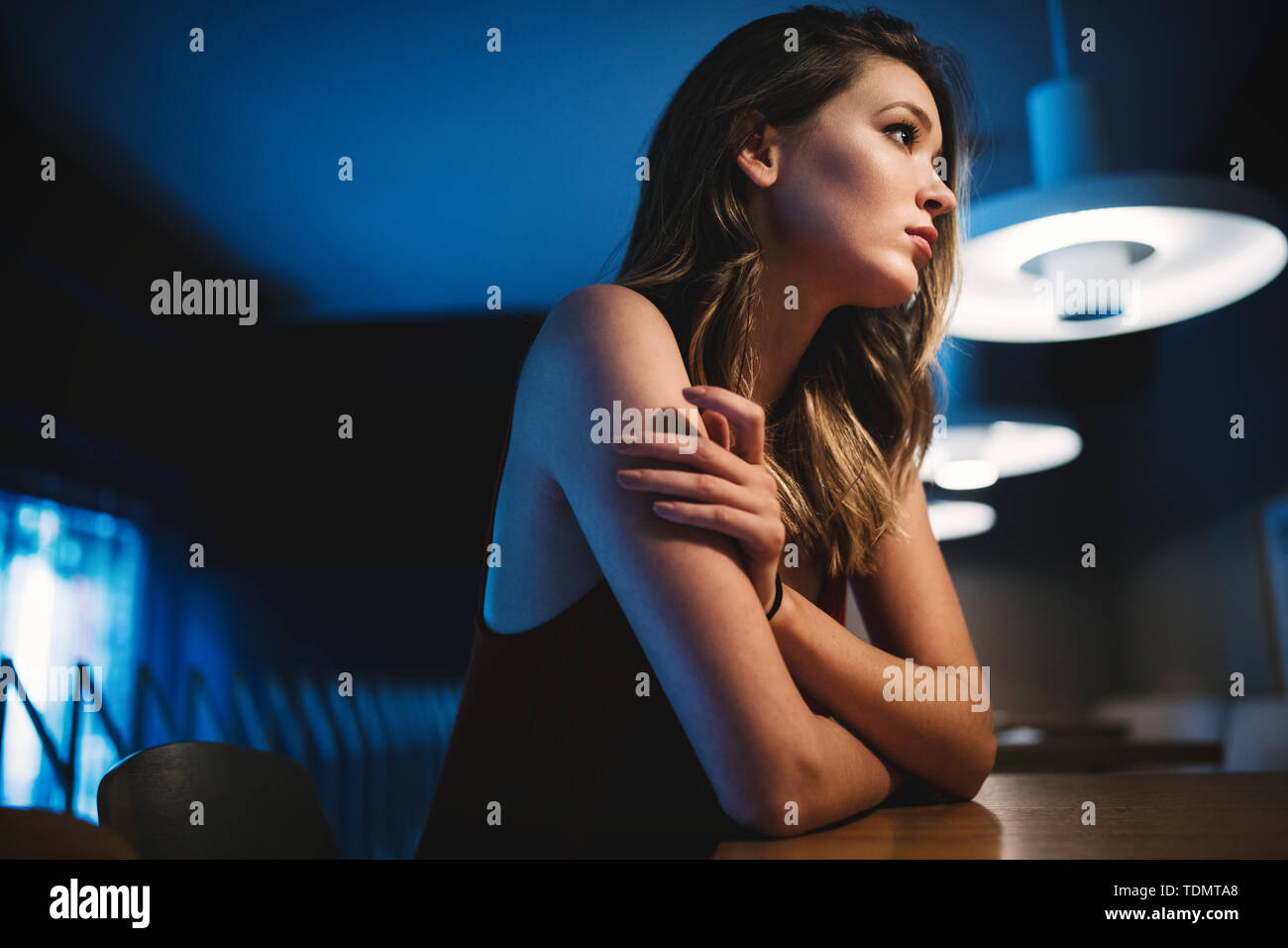 Portrait of clever young woman thinking alone Stock Photo - Alamy