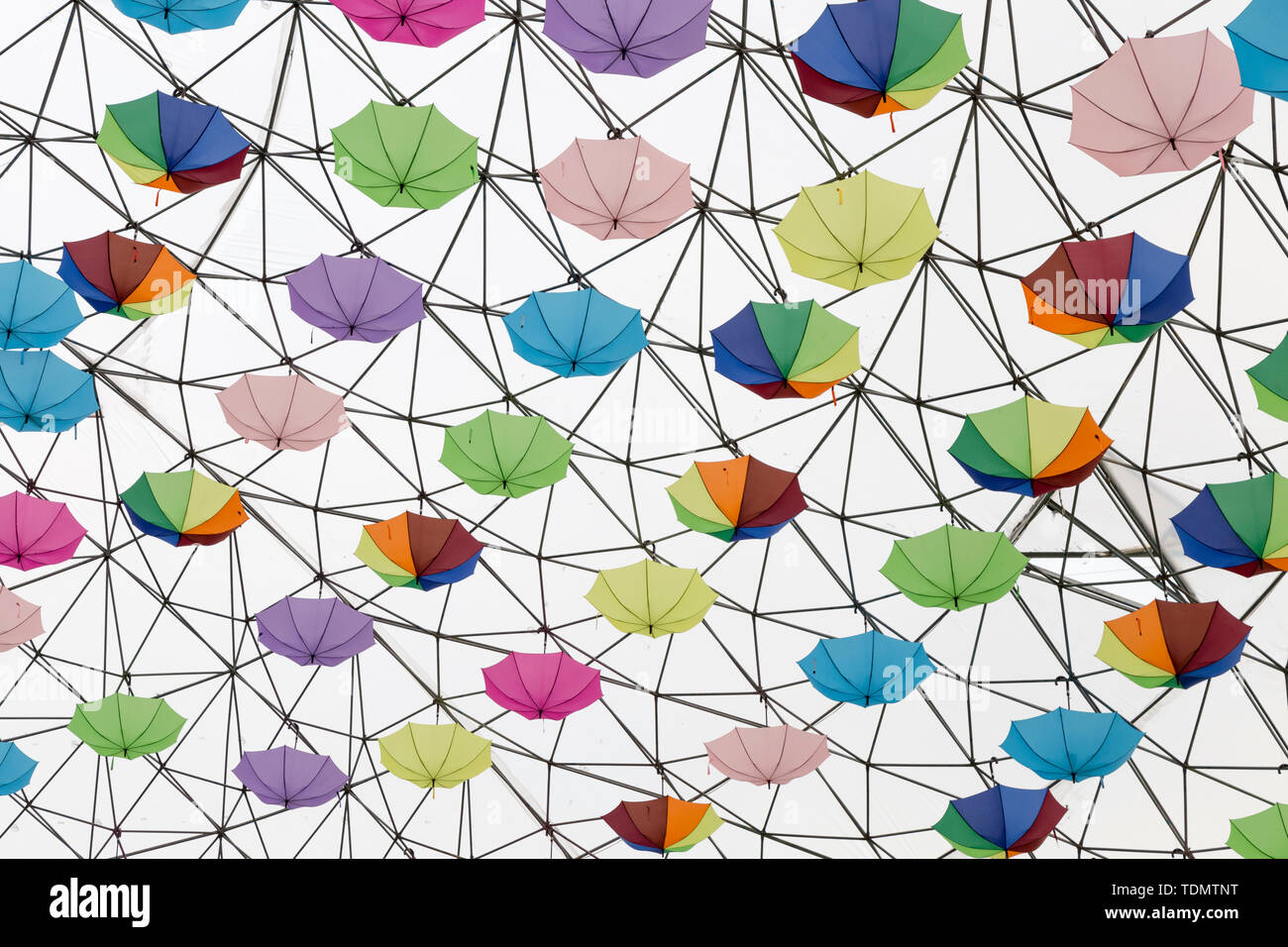 Coloured umbrella street art hi-res stock photography and images - Alamy