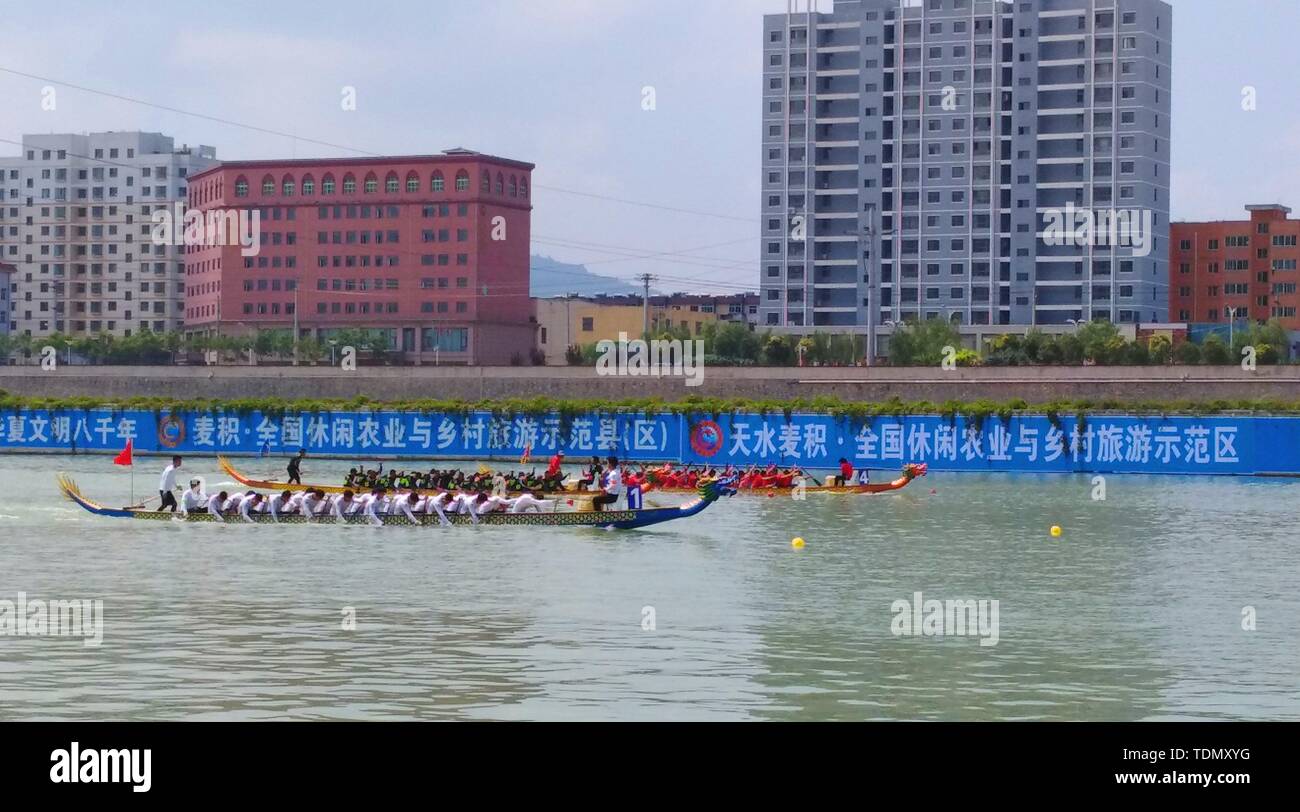 Dragon Boat race above Cuihu, China Dragon Boat Open Gansu Tianshui ...
