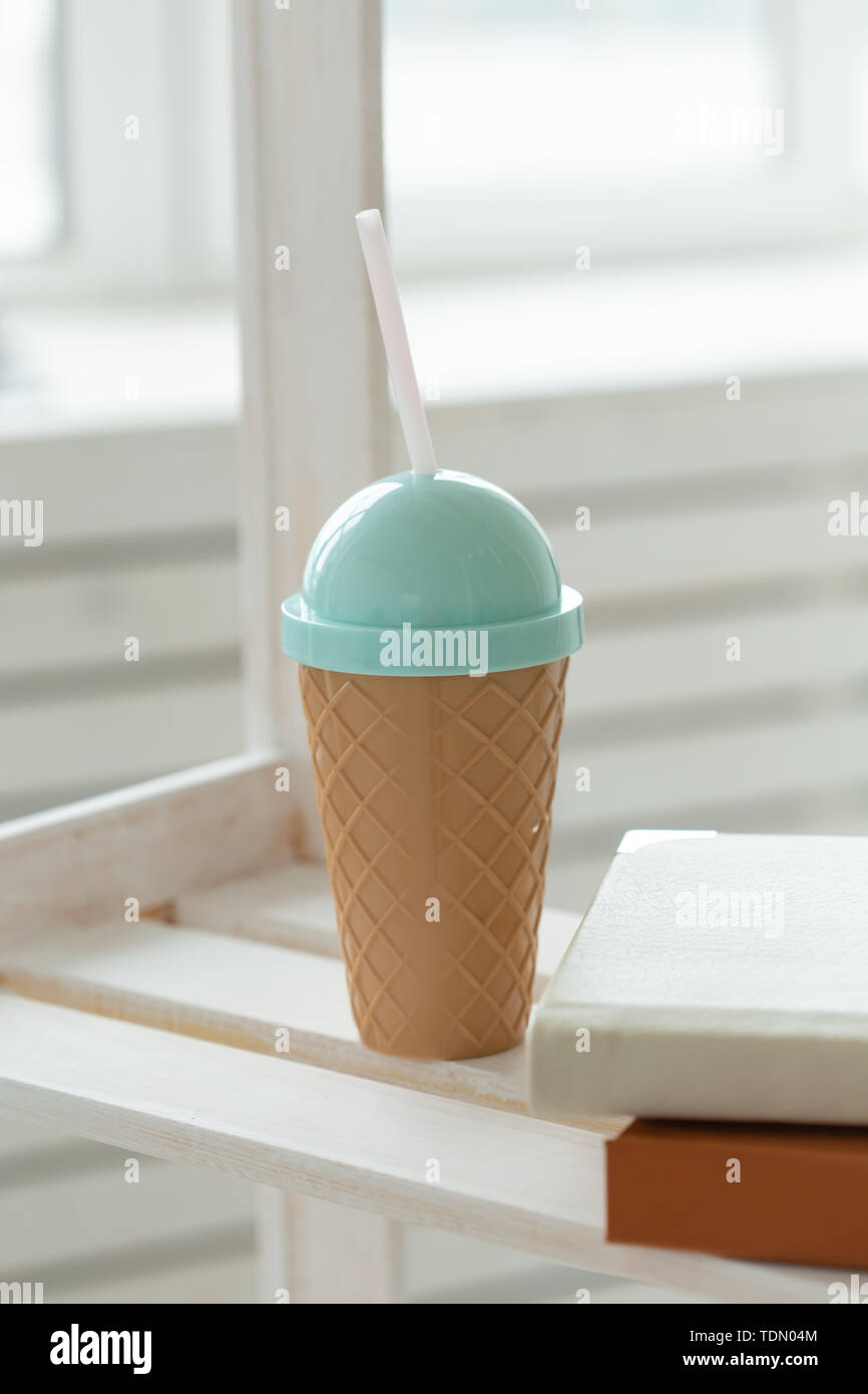 Plastic bottle form as ice cream on the shelf Stock Photo - Alamy