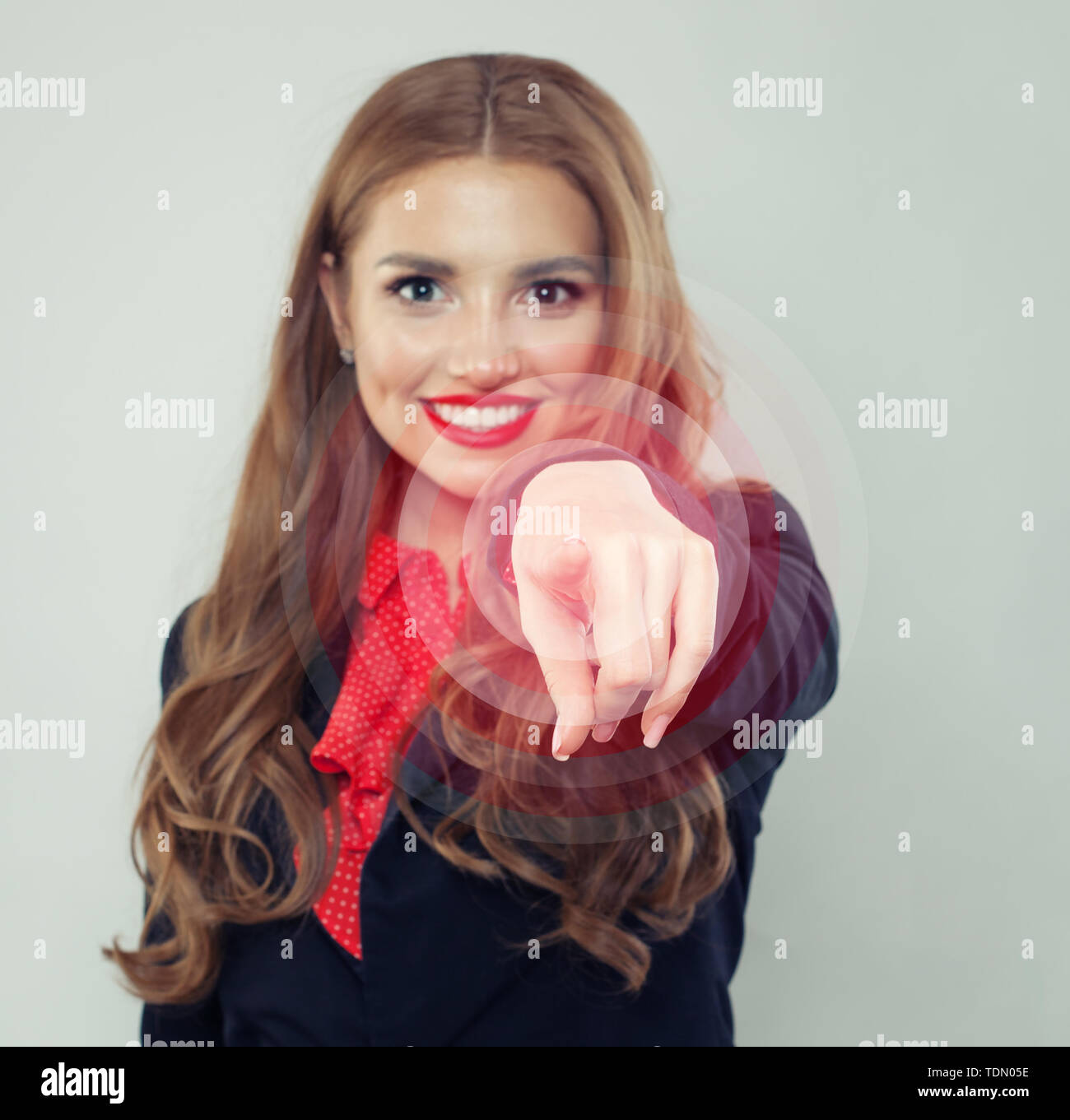 Finger of happy woman pushing a button Stock Photo - Alamy
