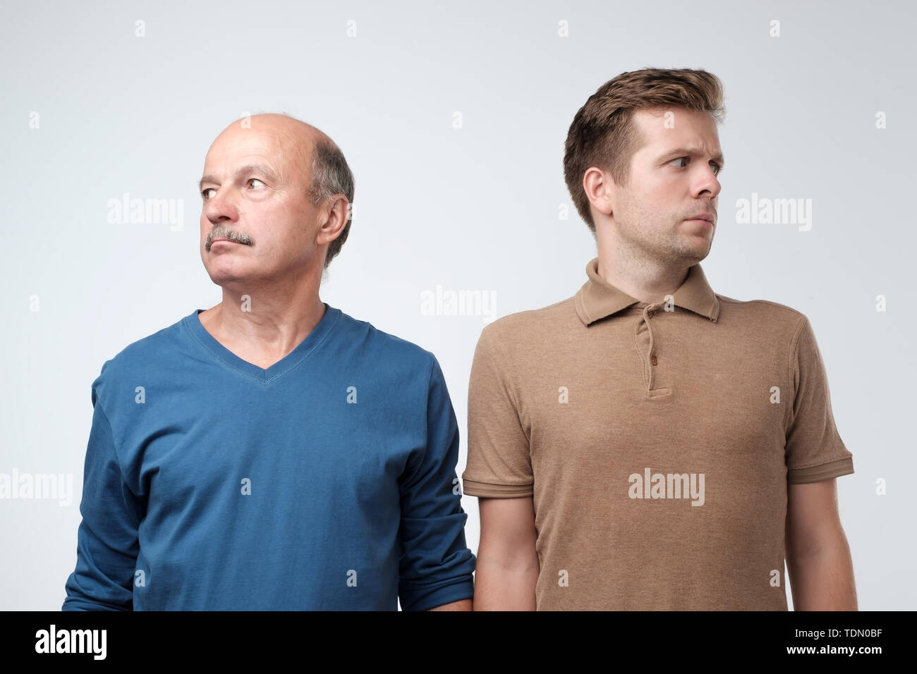 Boy standing sad isolated hi-res stock photography and images - Alamy