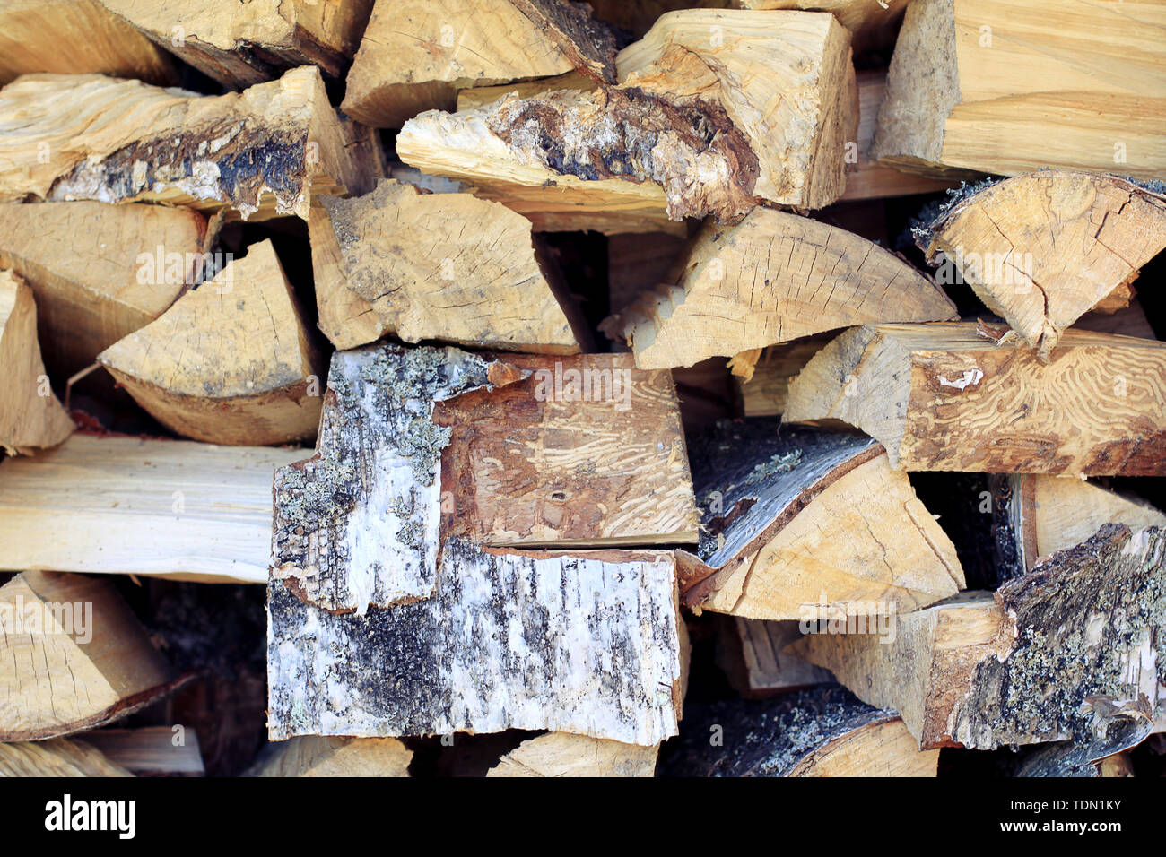Natural wooden decor background. Firewood log texture Stock Photo - Alamy