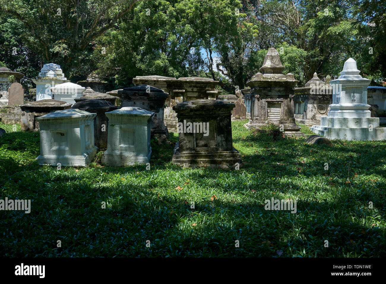 Graves in an old Protestant cemetery in George Town, Penang, Malaysia ...