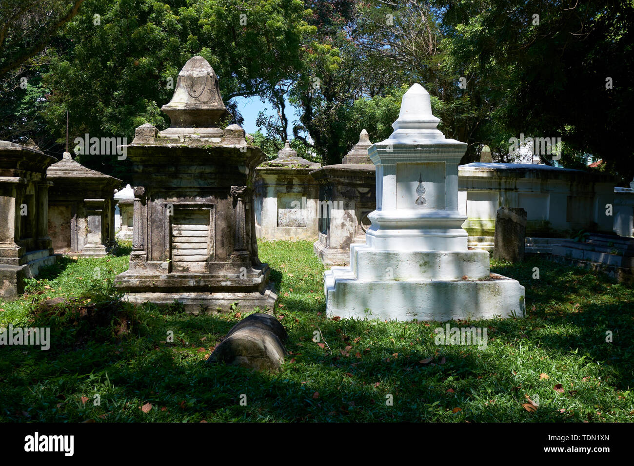 Graves in an old Protestant cemetery in George Town, Penang, Malaysia ...