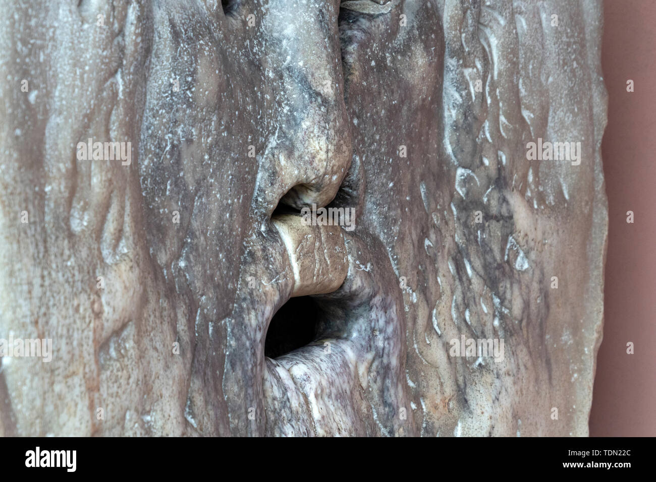 The mouth of truth mask in Rome Legend is put hand inside mouth and If ...