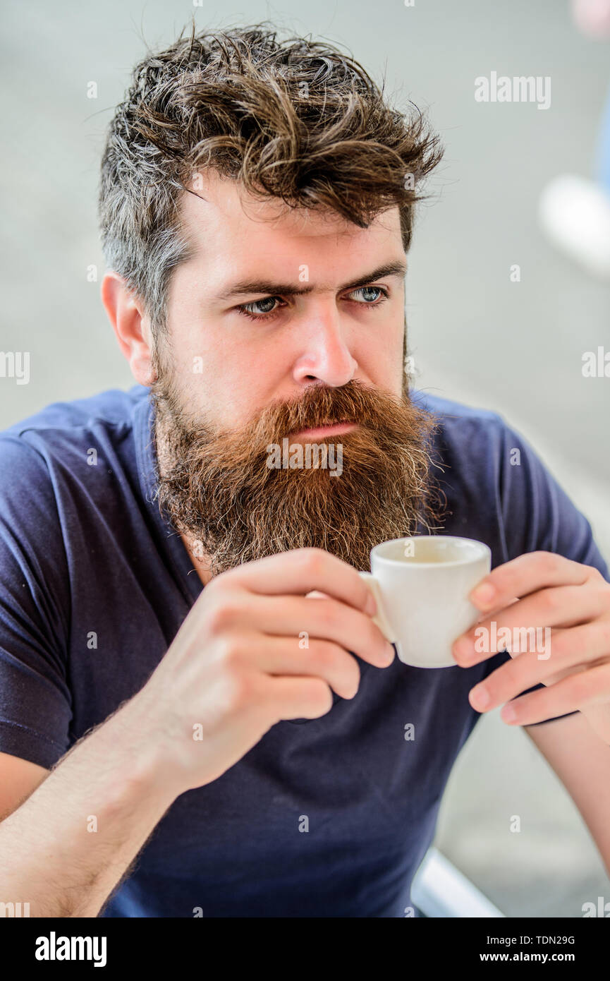 Bearded man in cafe. brutal male needs morning refreshment. drink ...