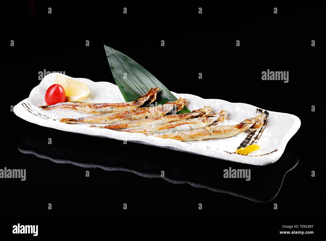 Fried spring fish Stock Photo - Alamy