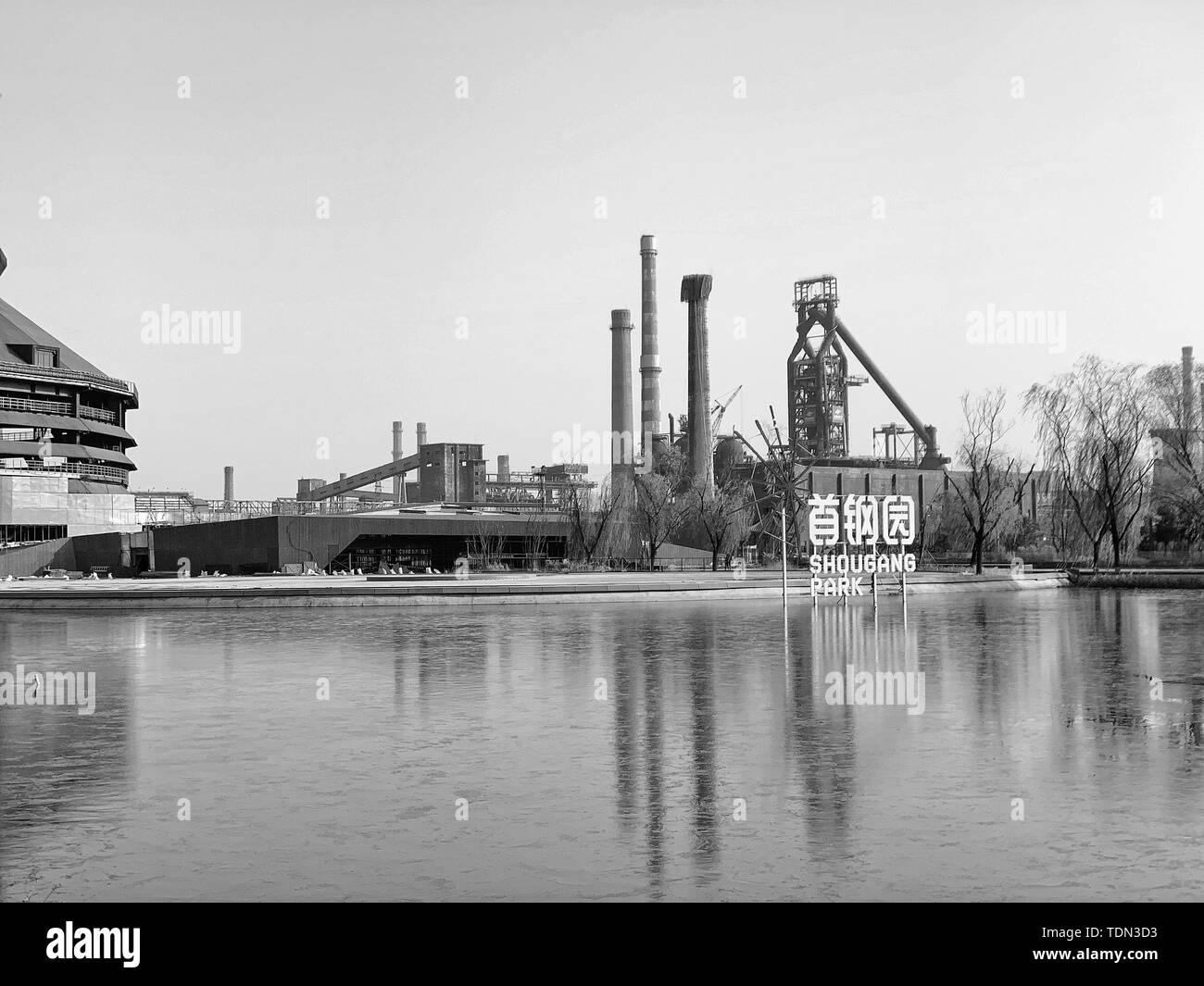 Old locomotive and factory buildings Black and White Stock Photos ...