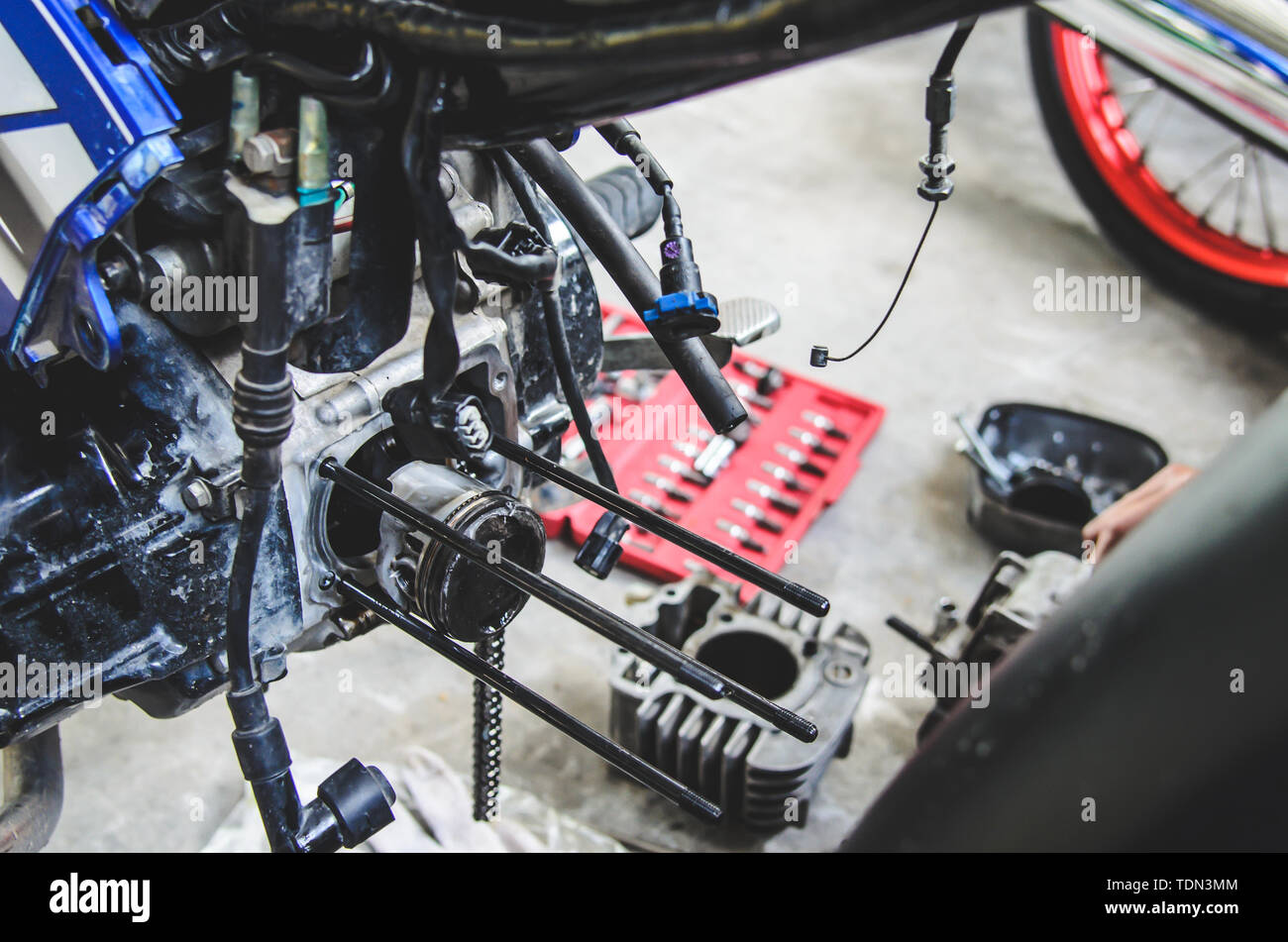 Mechanical repairs engine motorcycle Stock Photo - Alamy
