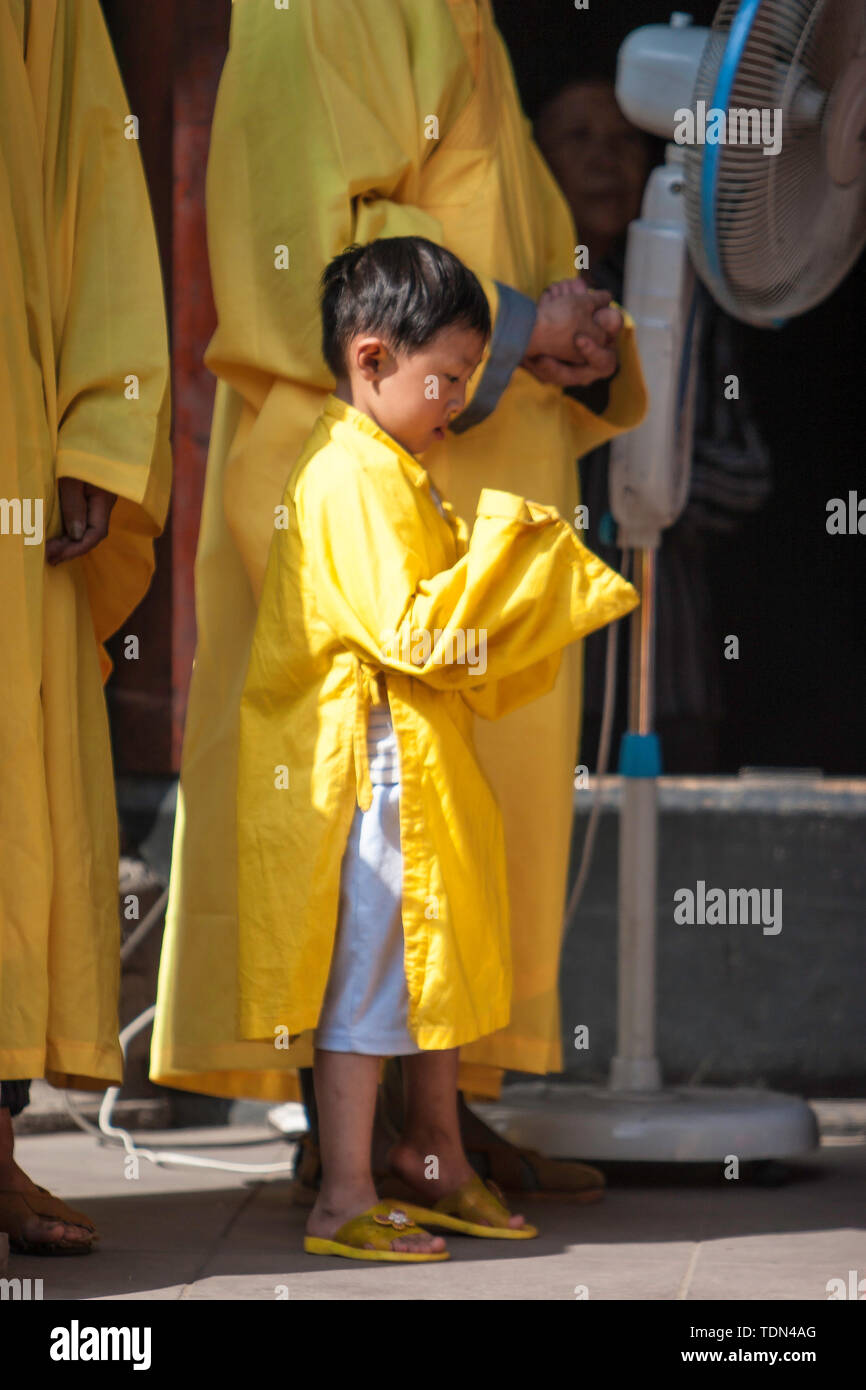 Temple abbot and believers Stock Photo - Alamy