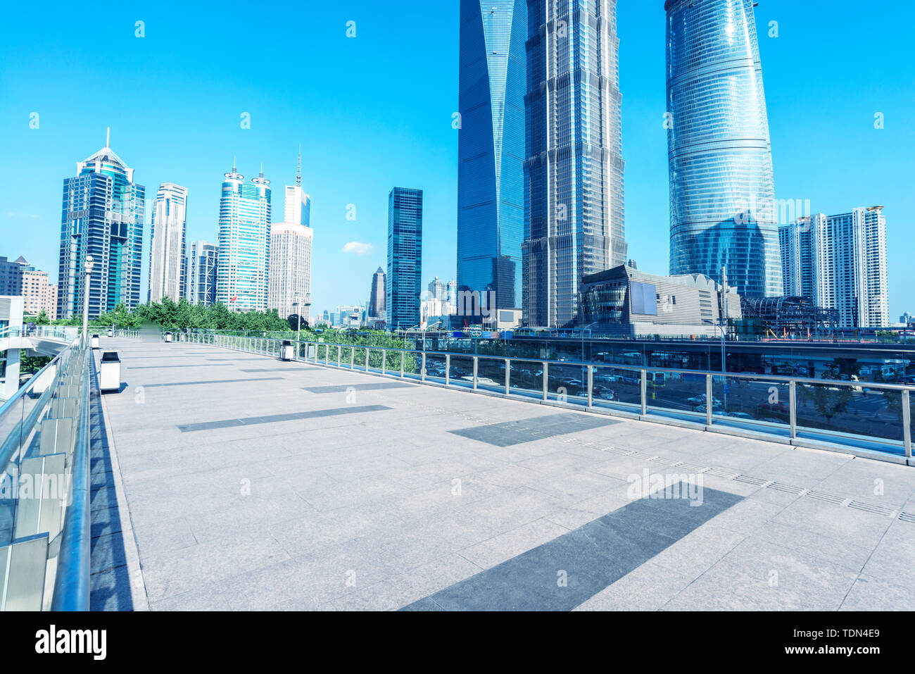modern office buildings in shanghai from empty footpath Stock Photo - Alamy