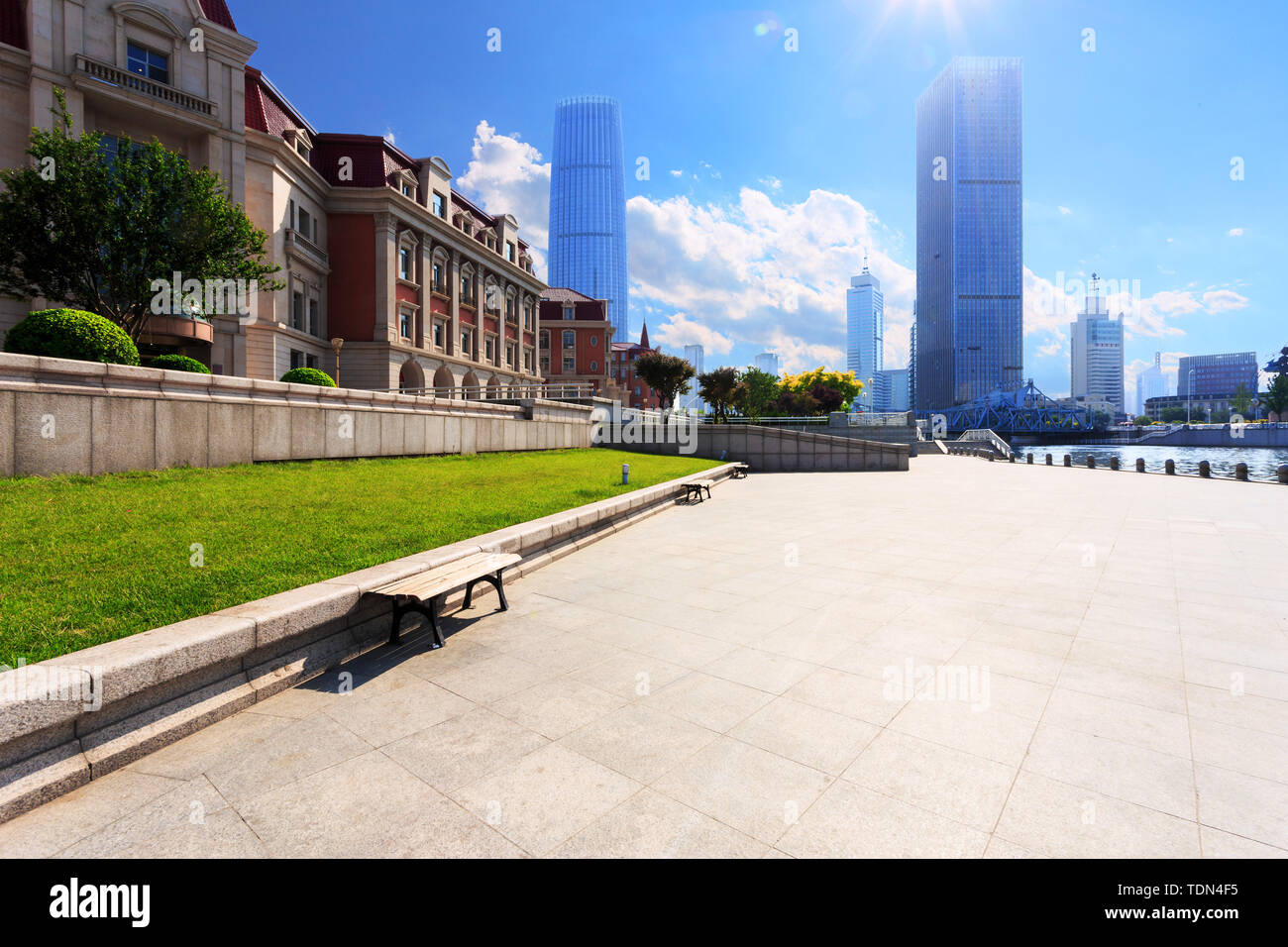Modern building with empty road floor Stock Photo - Alamy