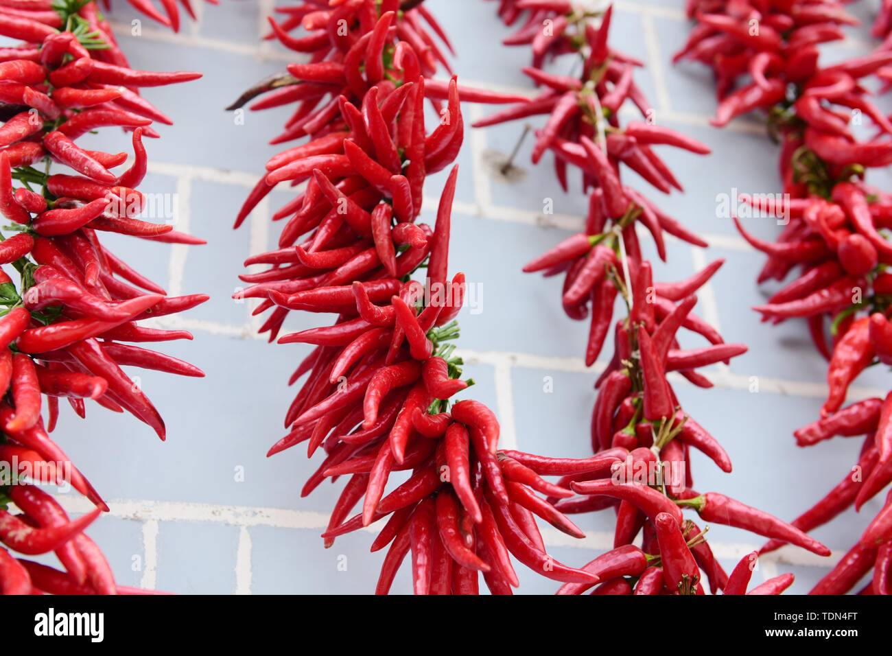 Farmhouse red pepper decoration Stock Photo - Alamy