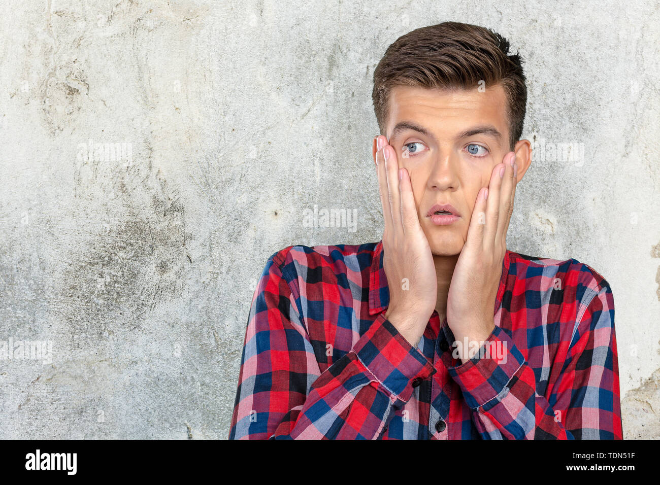 Closeup stressed young man Stock Photo - Alamy