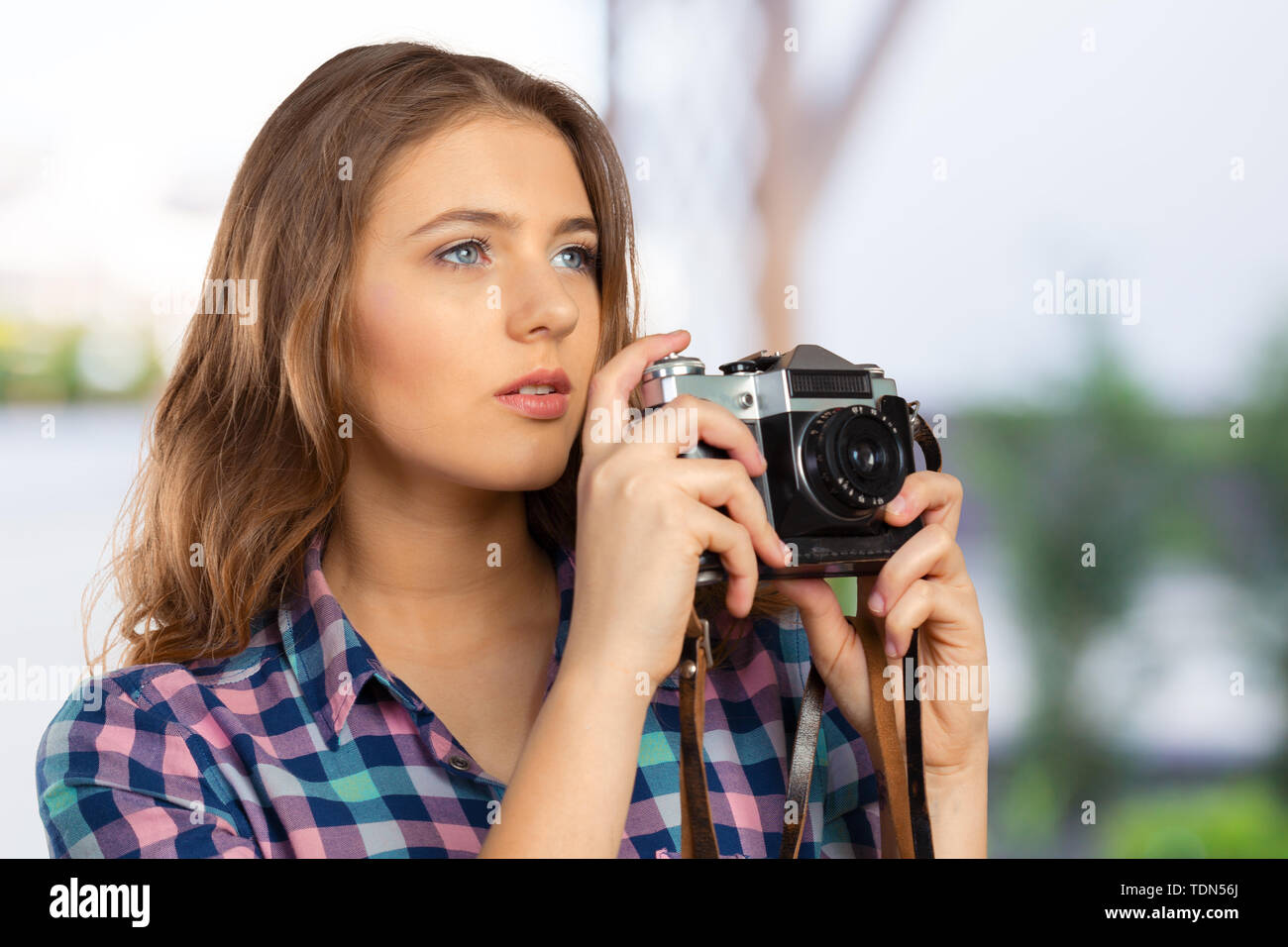 Woman photographer with camera Stock Photo - Alamy