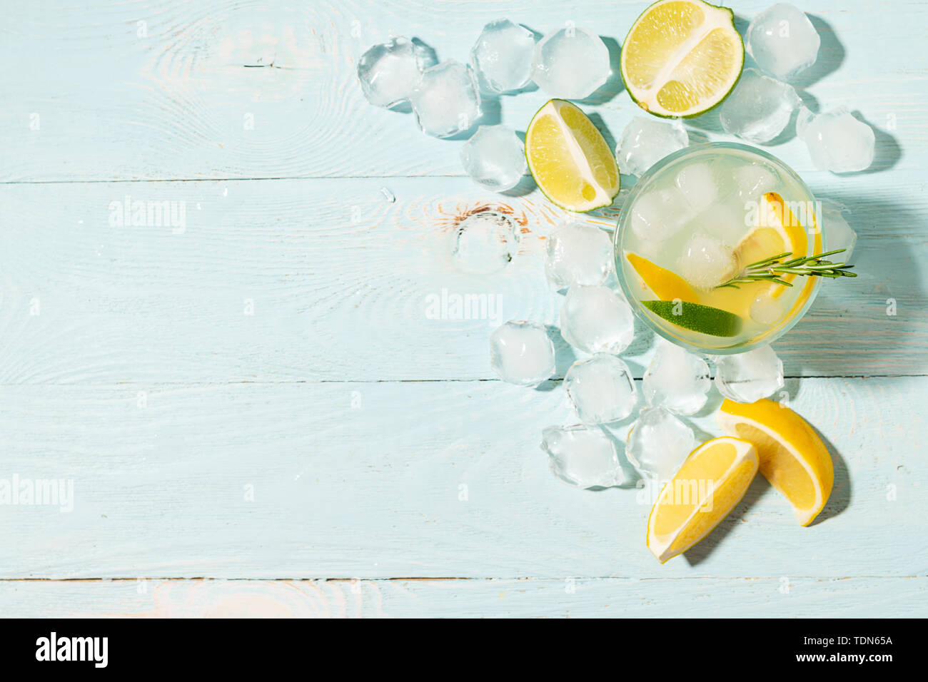 A drink of lemon and lime lemonade in transparent glasses blue ...