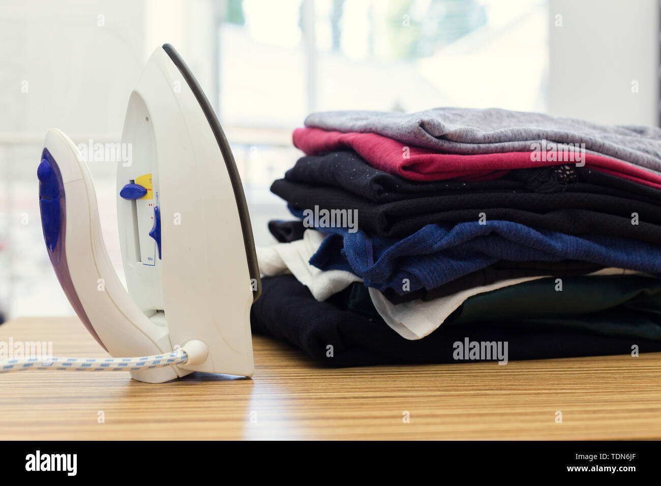 Stack of clothes Stock Photo - Alamy