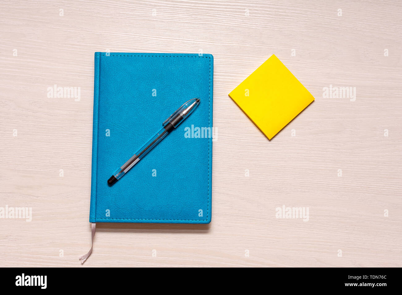 Business, planning and learning concept-closed diary of turquoise color ...