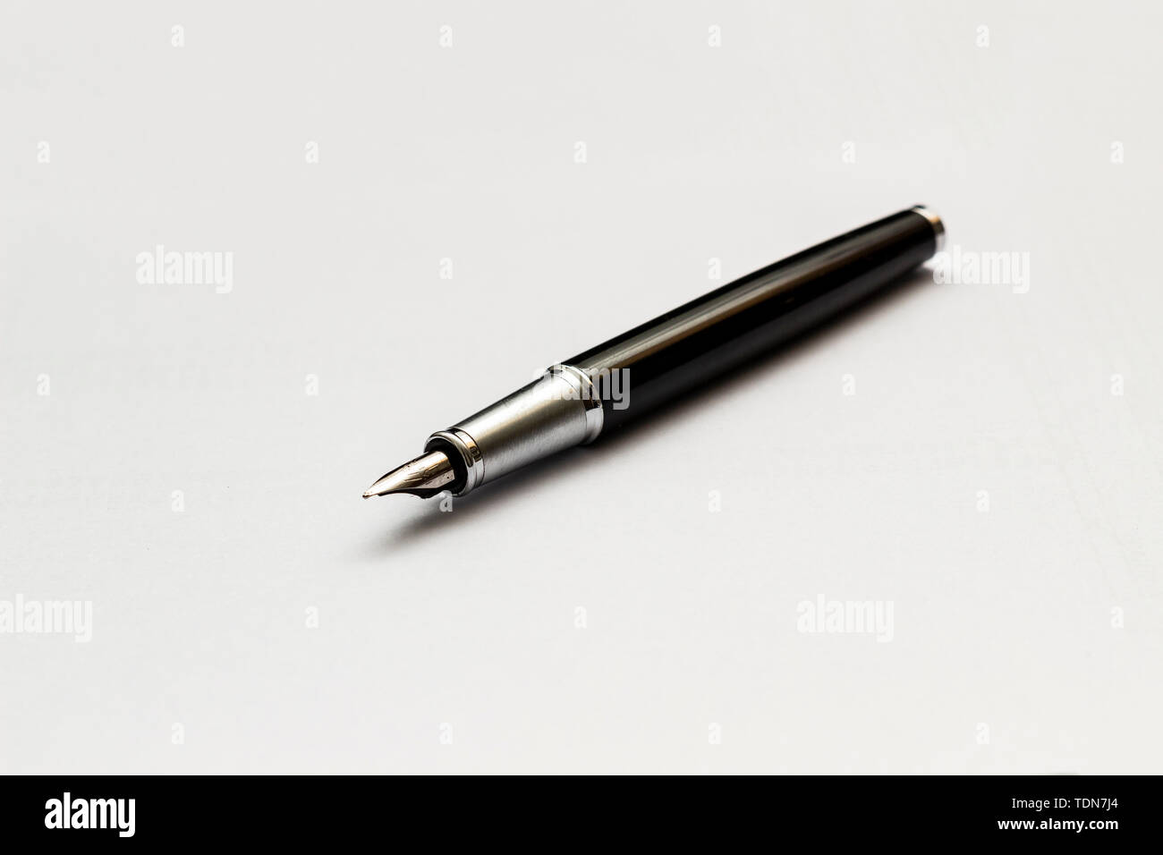 Business office writing pen Stock Photo - Alamy