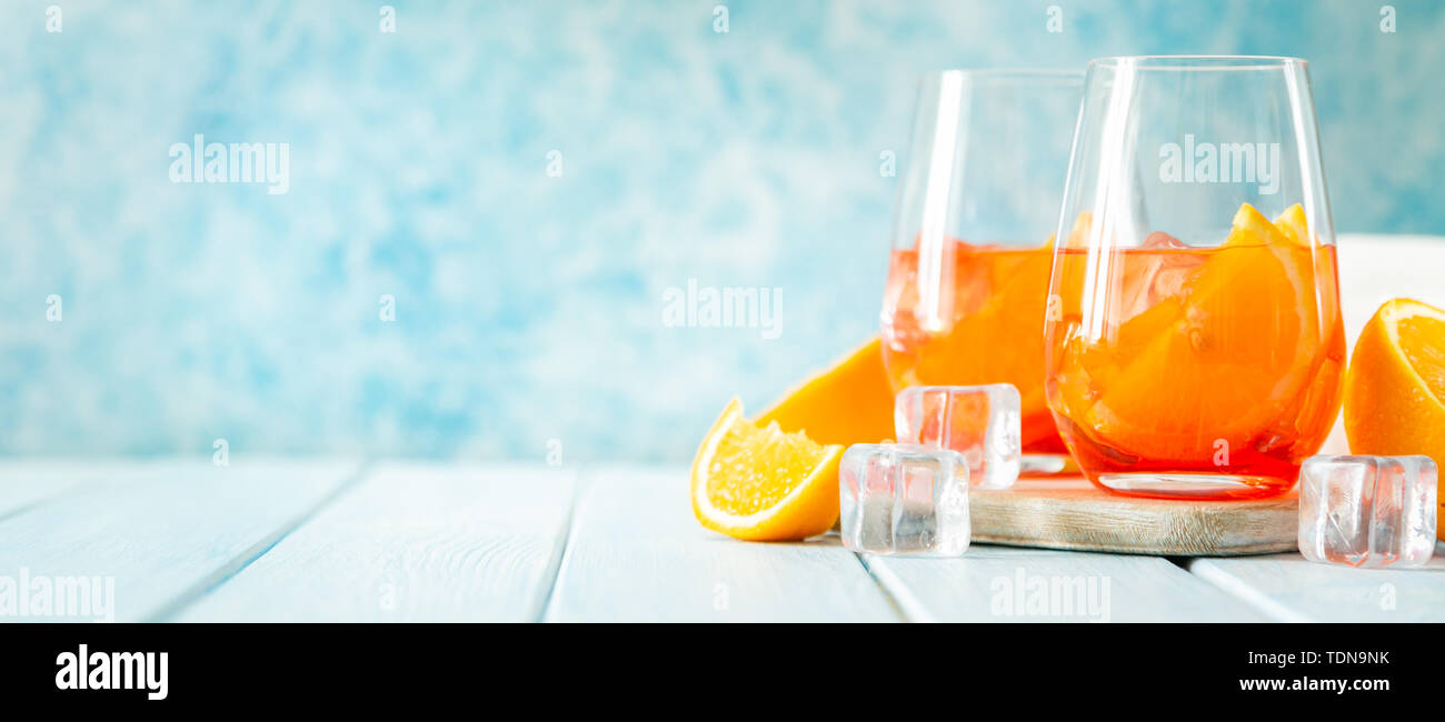 Aperol and ingredients drinks on wood background Stock Photo - Alamy