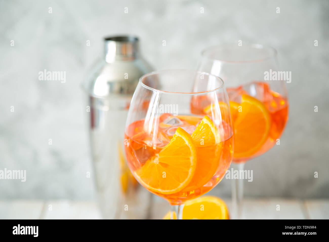 Aperol and ingredients drinks on wood background Stock Photo - Alamy