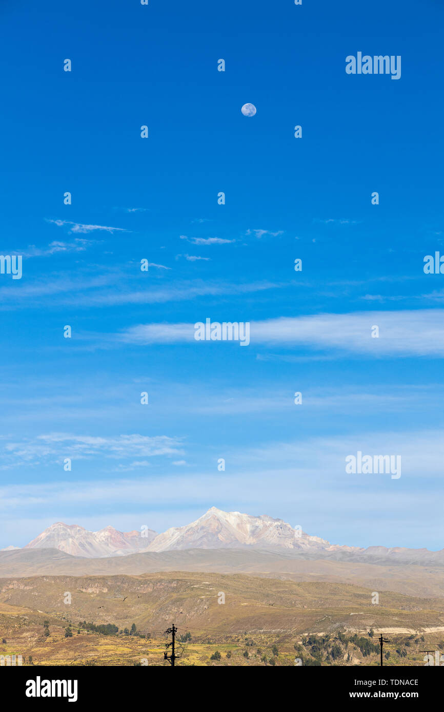 Full moon over the snowcapped Andes in Yanque, Colca canyon, Peru ...