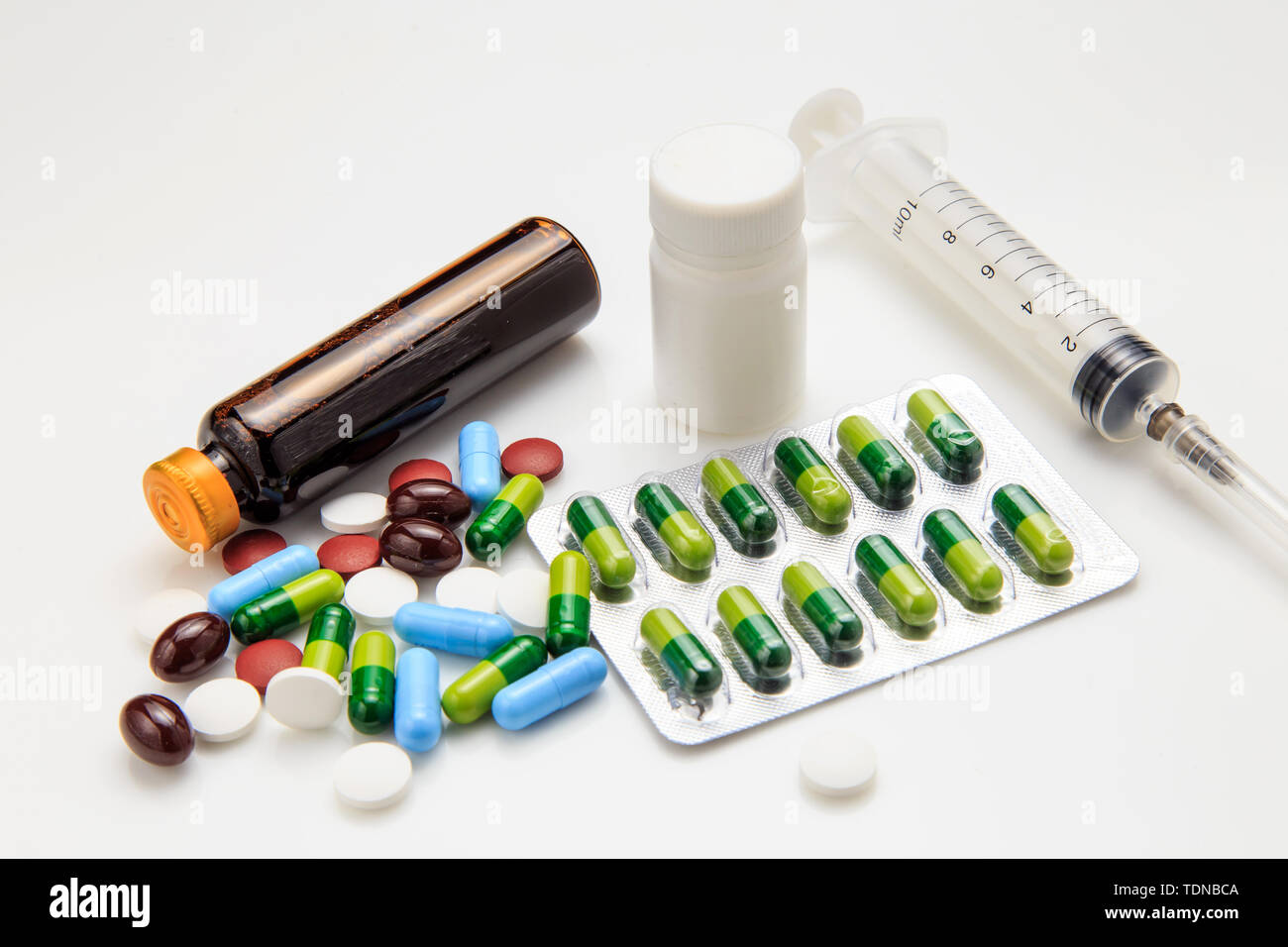 Medicines in white background Stock Photo - Alamy