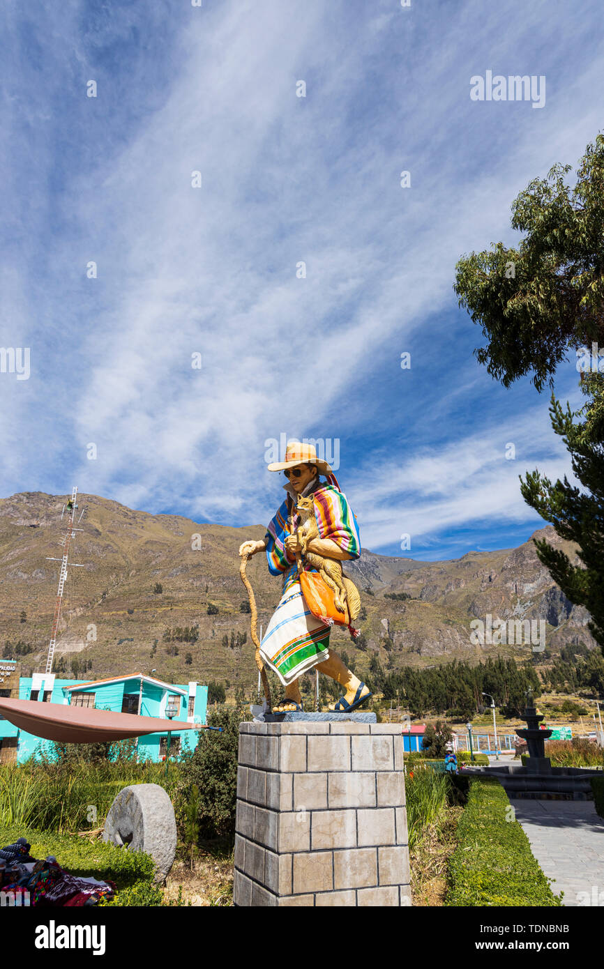 Statues of traditional dancers in the plaza at Maca, Colca Canyon, Peru ...