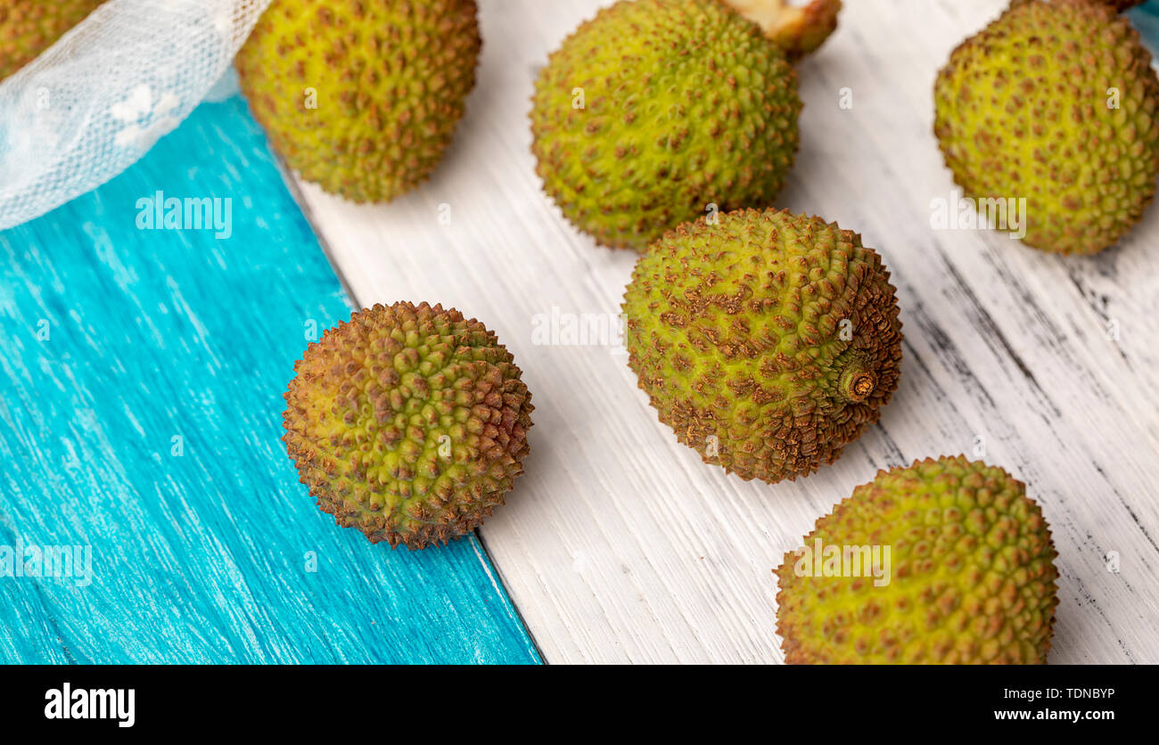 Fresh lychee on the table Stock Photo - Alamy