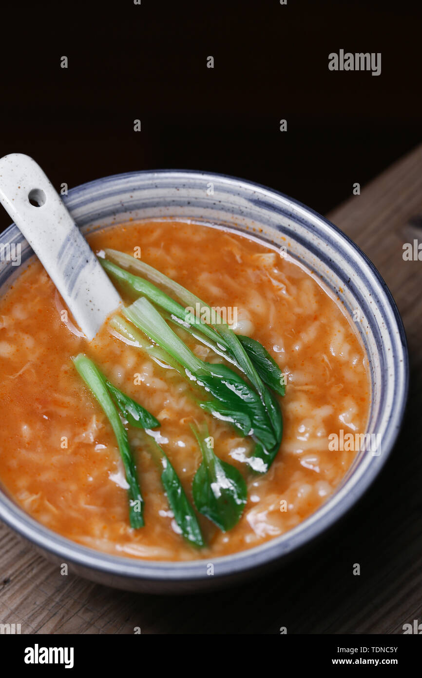 Traditional Chinese snack tomato lumpy soup Stock Photo - Alamy