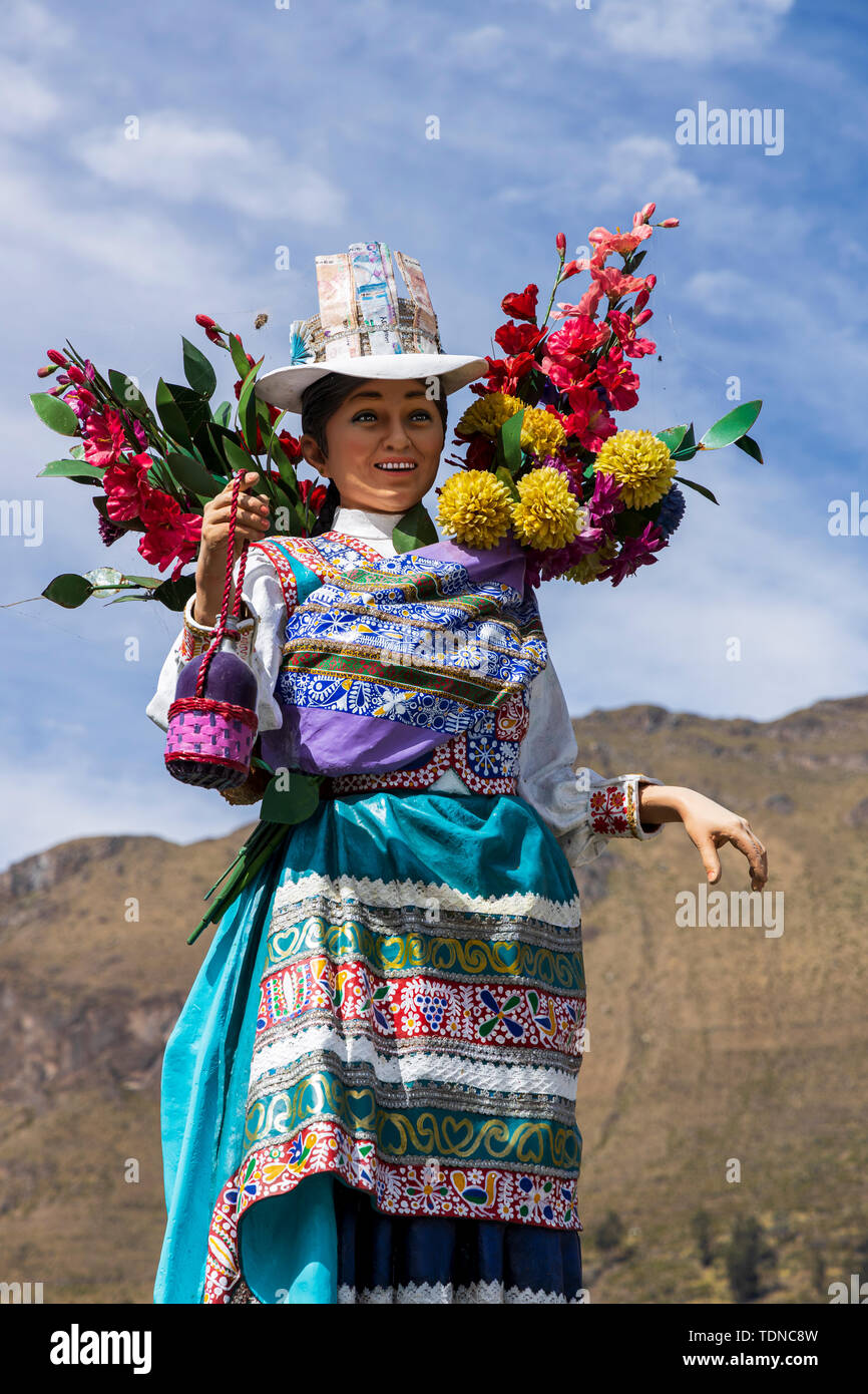 Statues of traditional dancers in the plaza at Maca, Colca Canyon, Peru ...