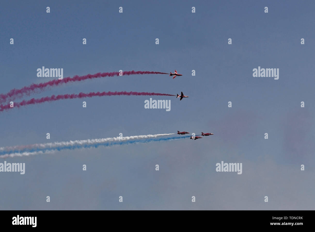 Red Arrows Roll Back Stock Photo - Alamy