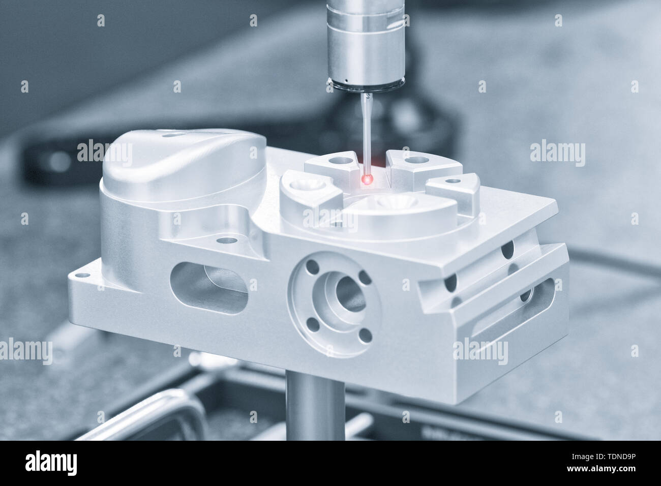 Operator inspection dimension metal parts by CMM after machining ...